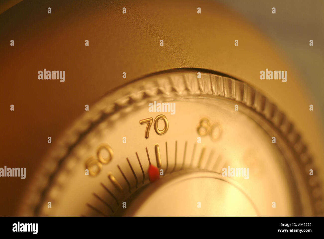 A home thermostat set on 68 degrees close-up Stock Photo - Alamy