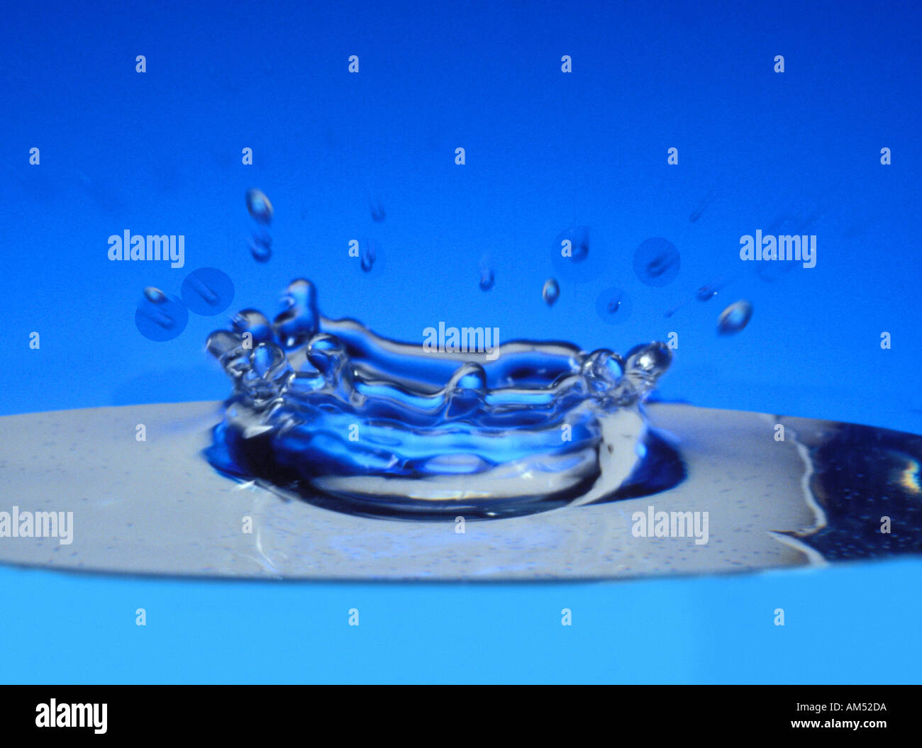 water drop splashing and making a crown shaped ring Stock Photo - Alamy