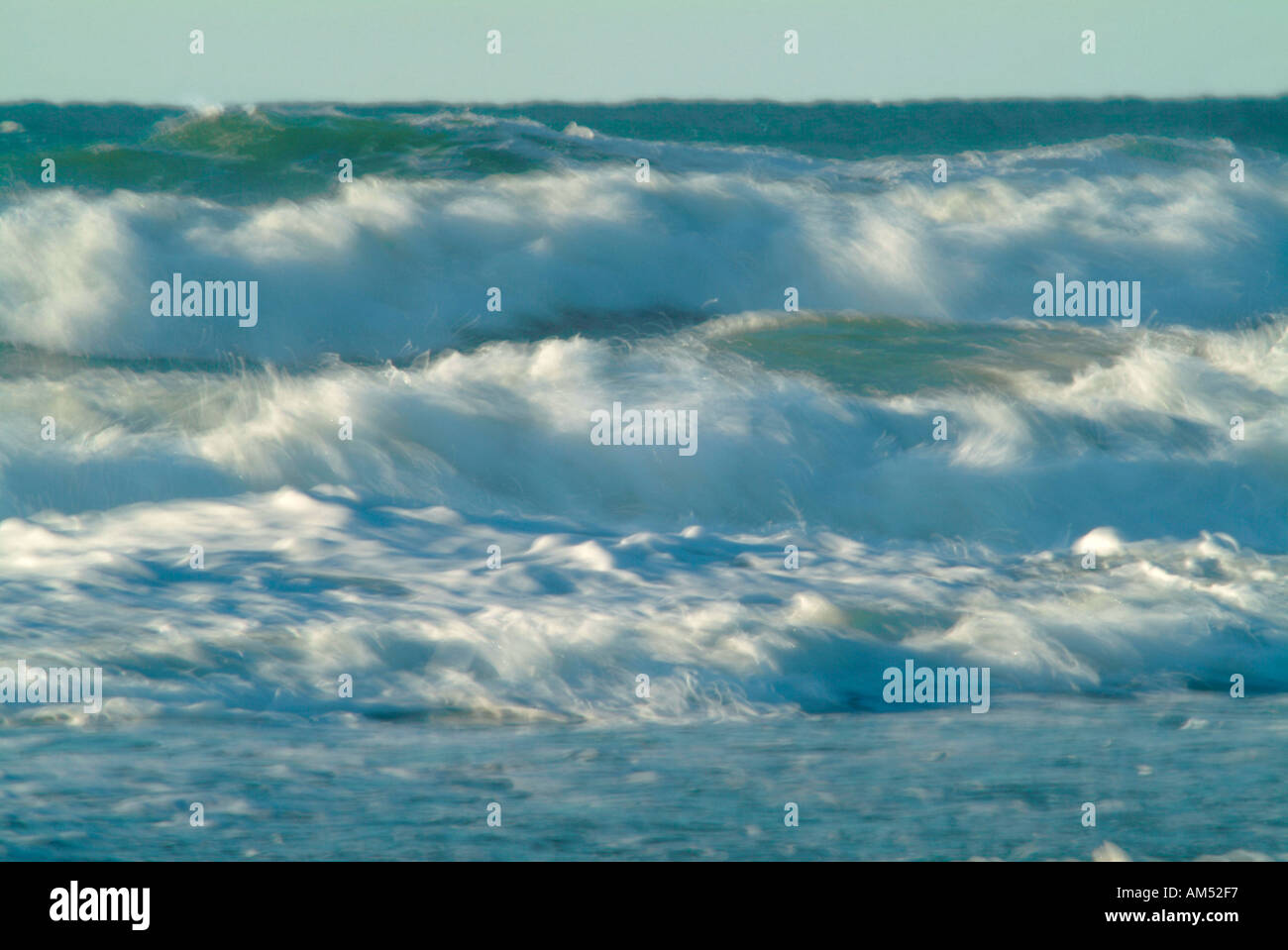 Beach and sea with rolling waves hi-res stock photography and images ...