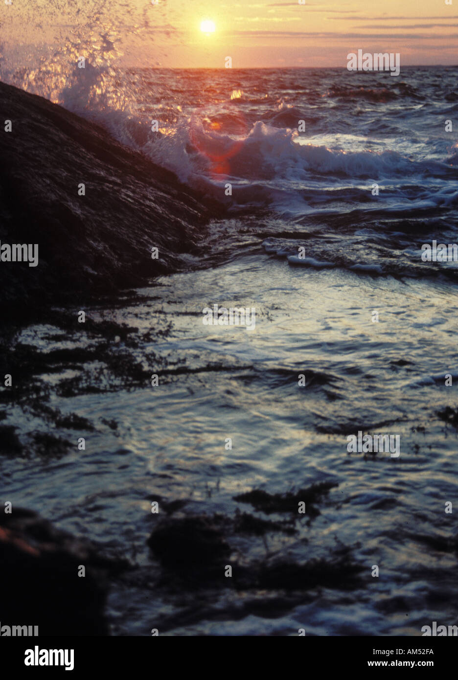 Ocean wave breaks on rocks hi-res stock photography and images - Alamy