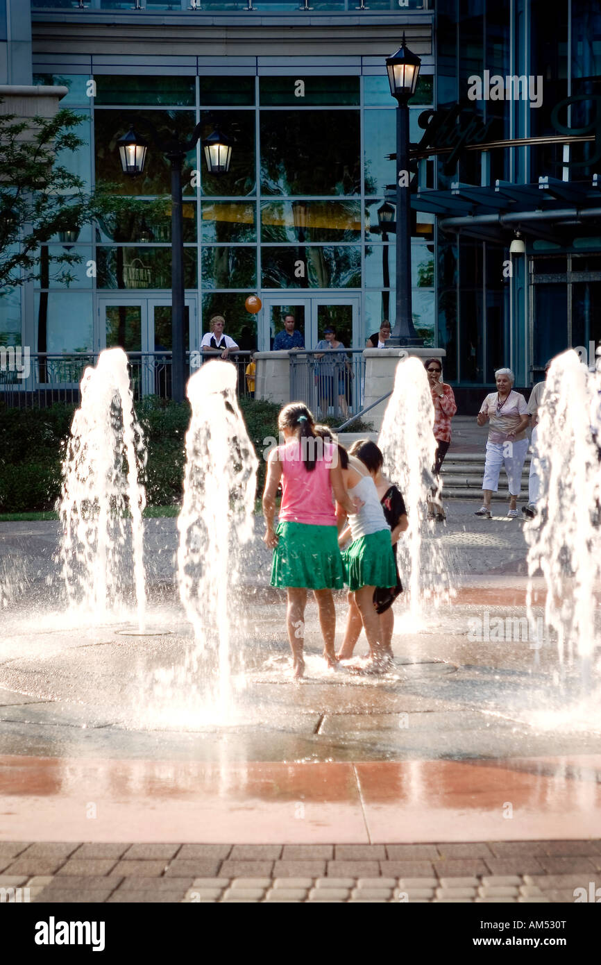 Kids playing at water fountain Stock Photo - Alamy