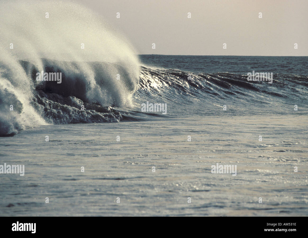 Powerful storm generated wind blown wave breaks near shore Stock Photo ...