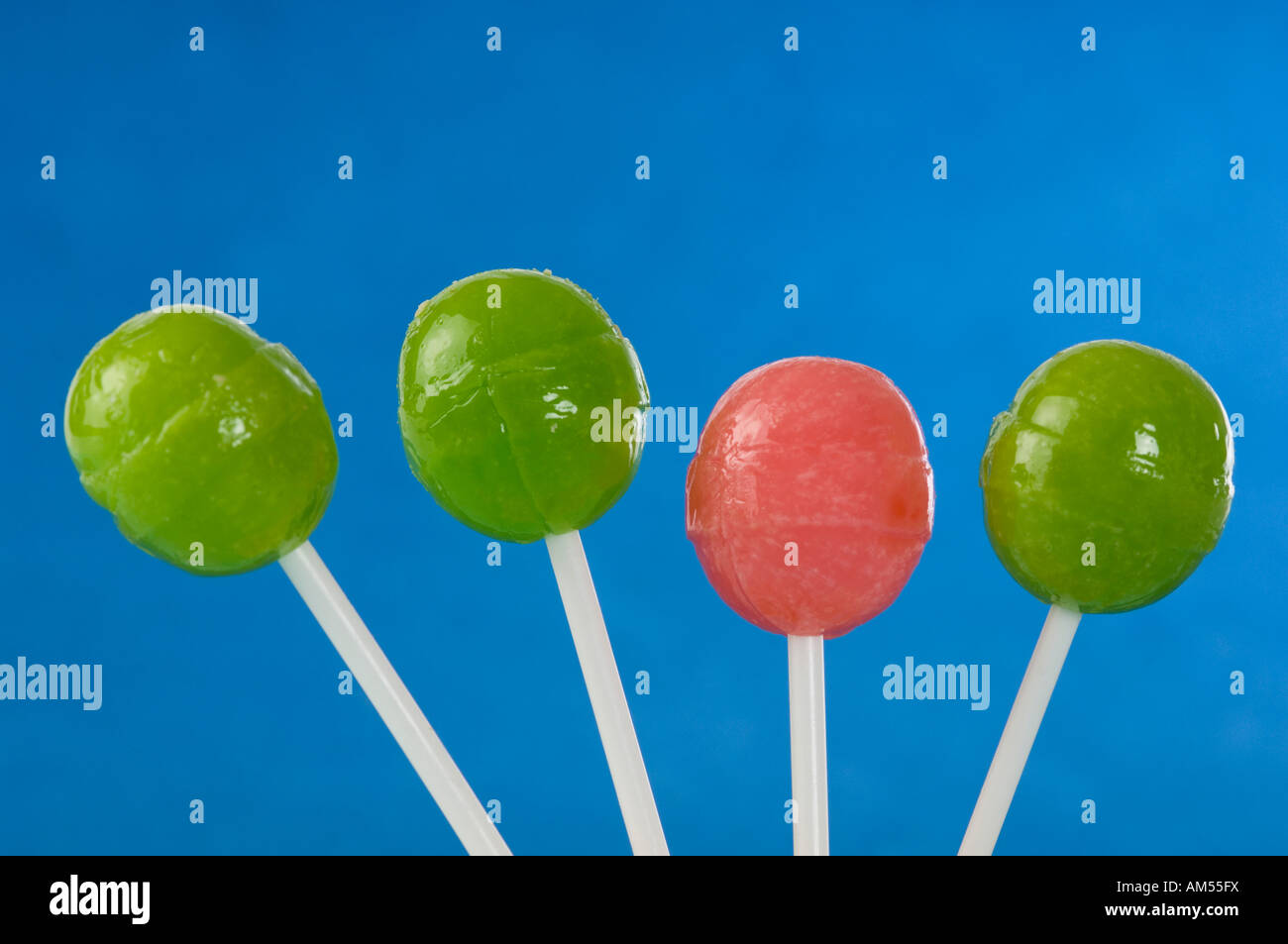 Close-up of four lollipops Stock Photo - Alamy