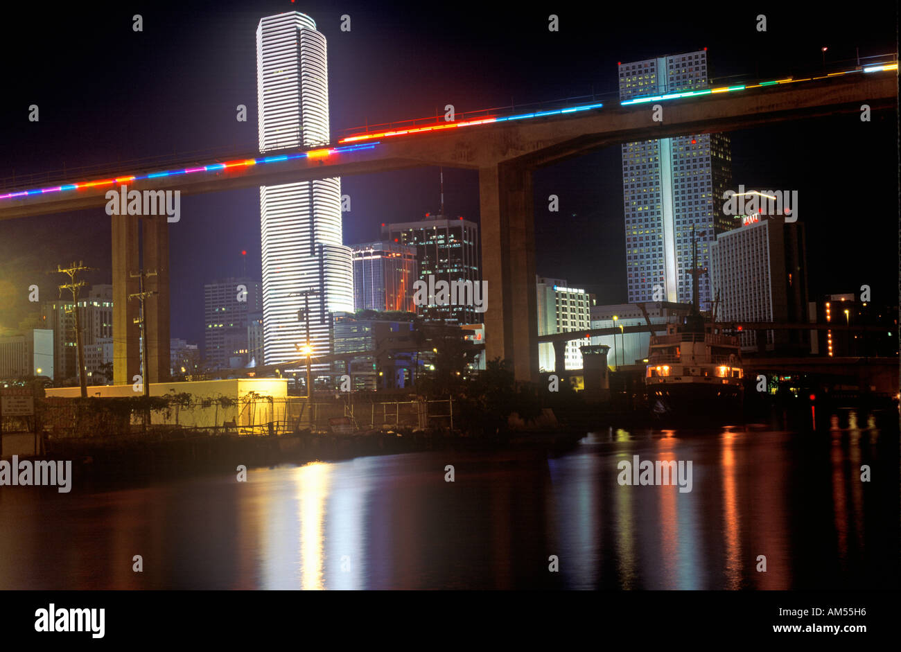 Miami skyline by night Centrust Building and Metro Rail Miami Florida ...