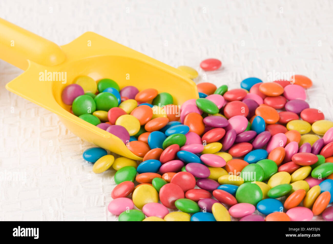 Assorted candies with a scoop Stock Photo - Alamy