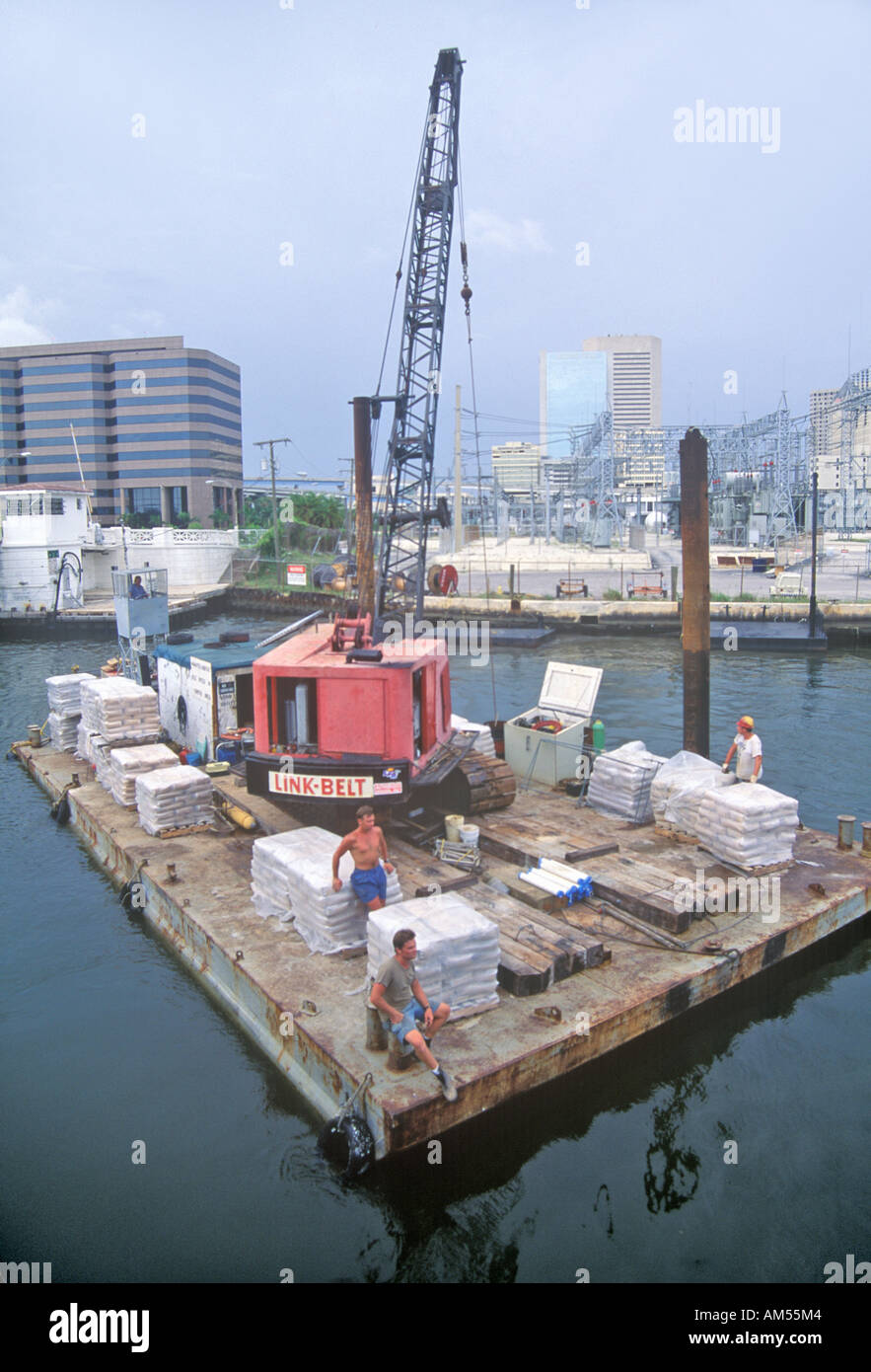 Crane and small barge Miami Harbor Miami Florida Stock Photo - Alamy