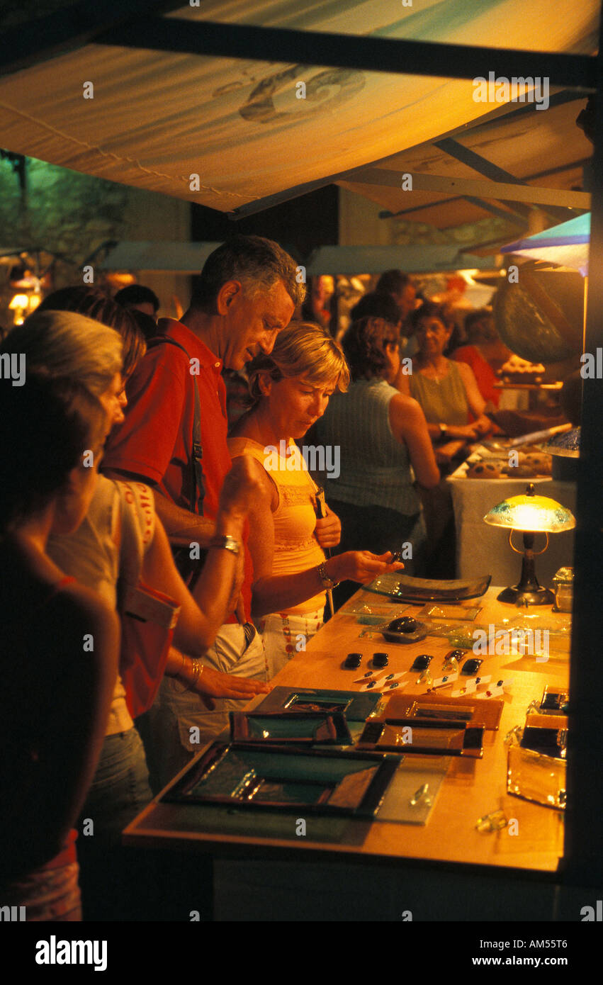 Altea tourists visiting the night market Stock Photo - Alamy