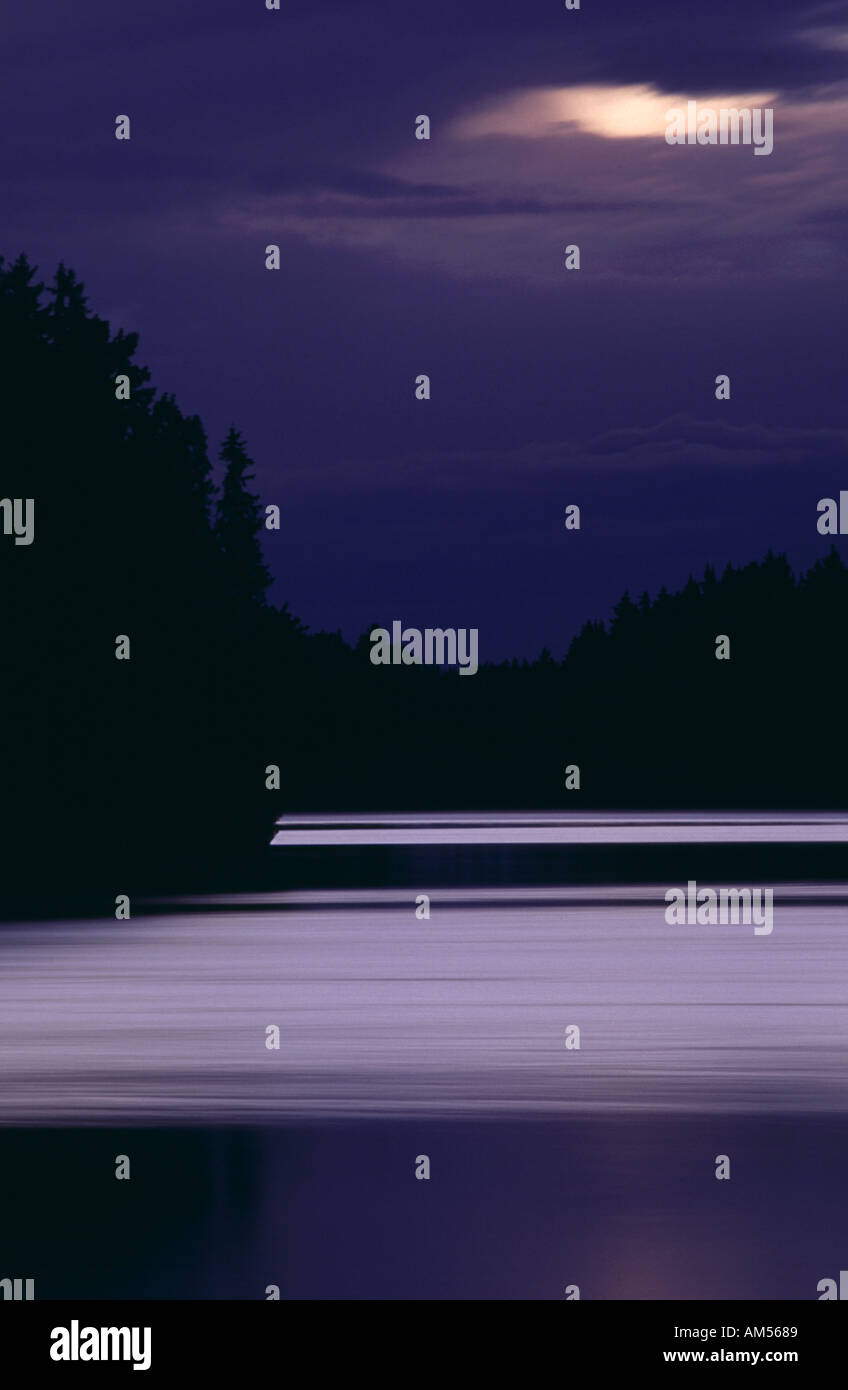 Moonlight over lake Stock Photo - Alamy