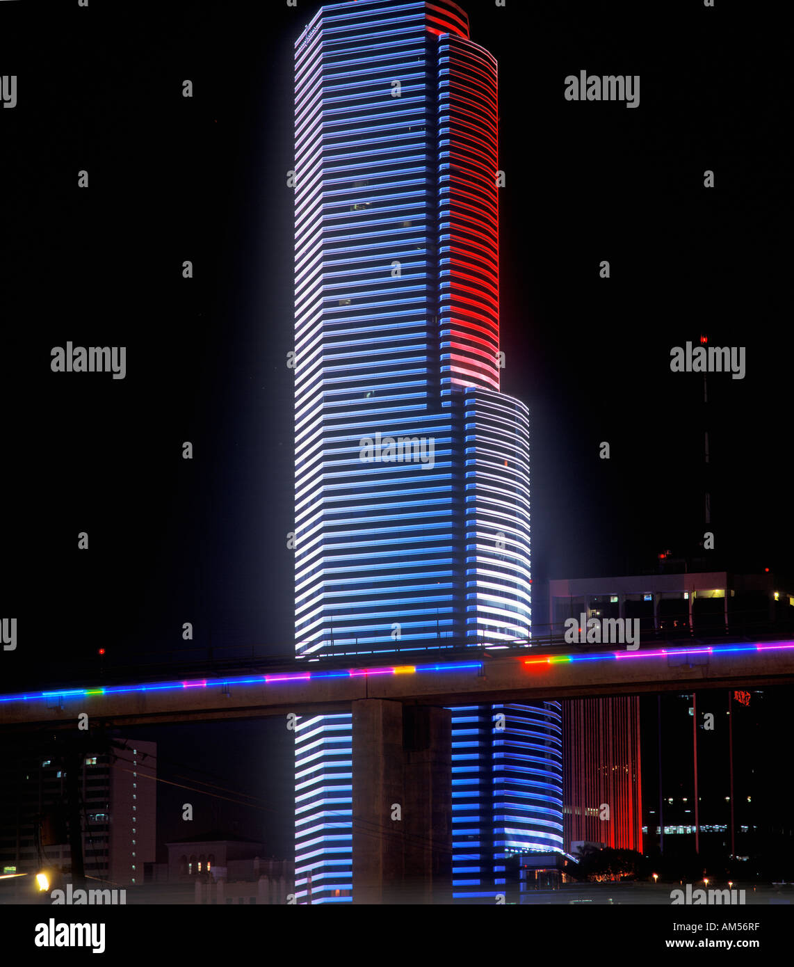 Miami skyline by night Centrust Building and Metro Rail Miami Florida ...