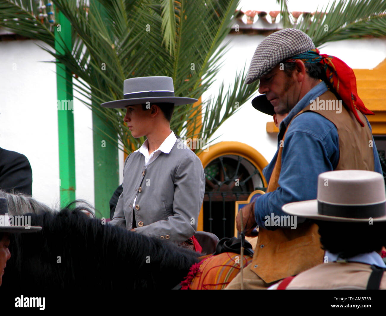 Spanish men in costume on horseback, at the Fuengirola Feria, Costa del ...
