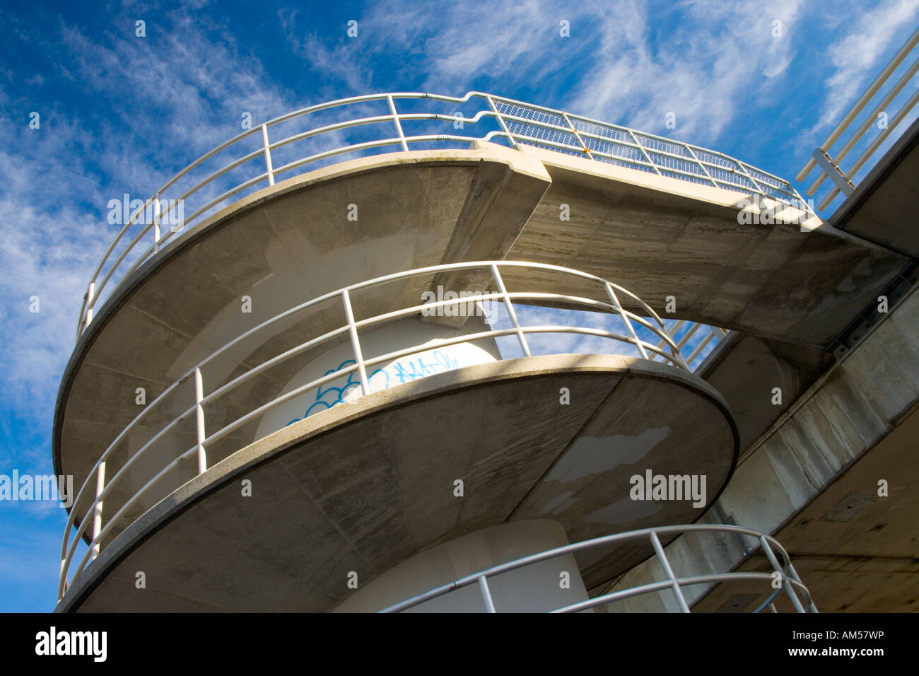 Spiral pedestrian walkway crossing highway Stock Photo - Alamy
