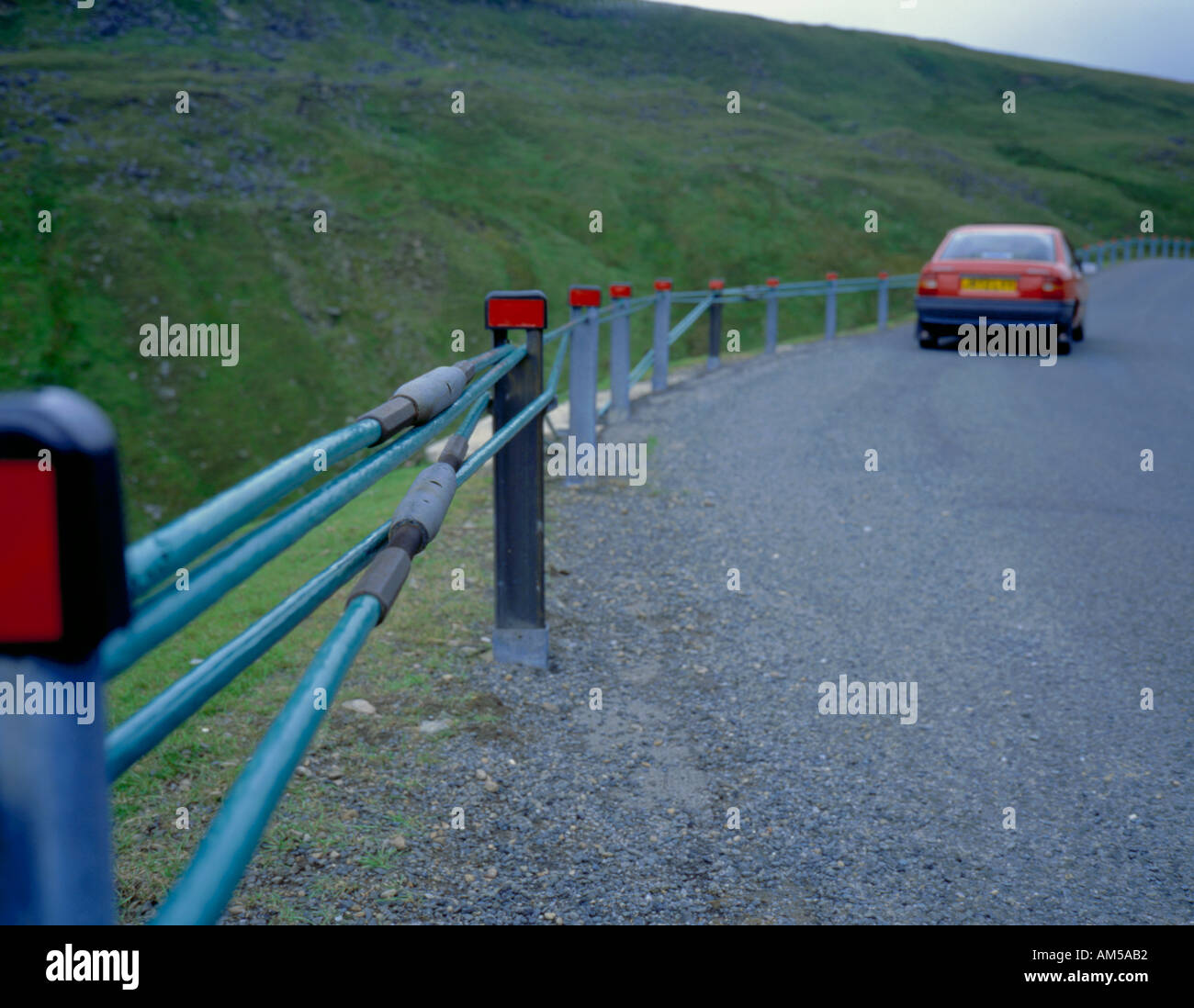 Steel cable type crash barrier showing bottle screws used to tension ...