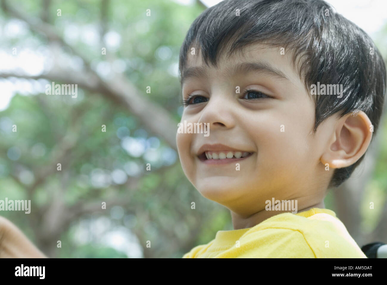 Close-up of a boy smiling Stock Photo - Alamy