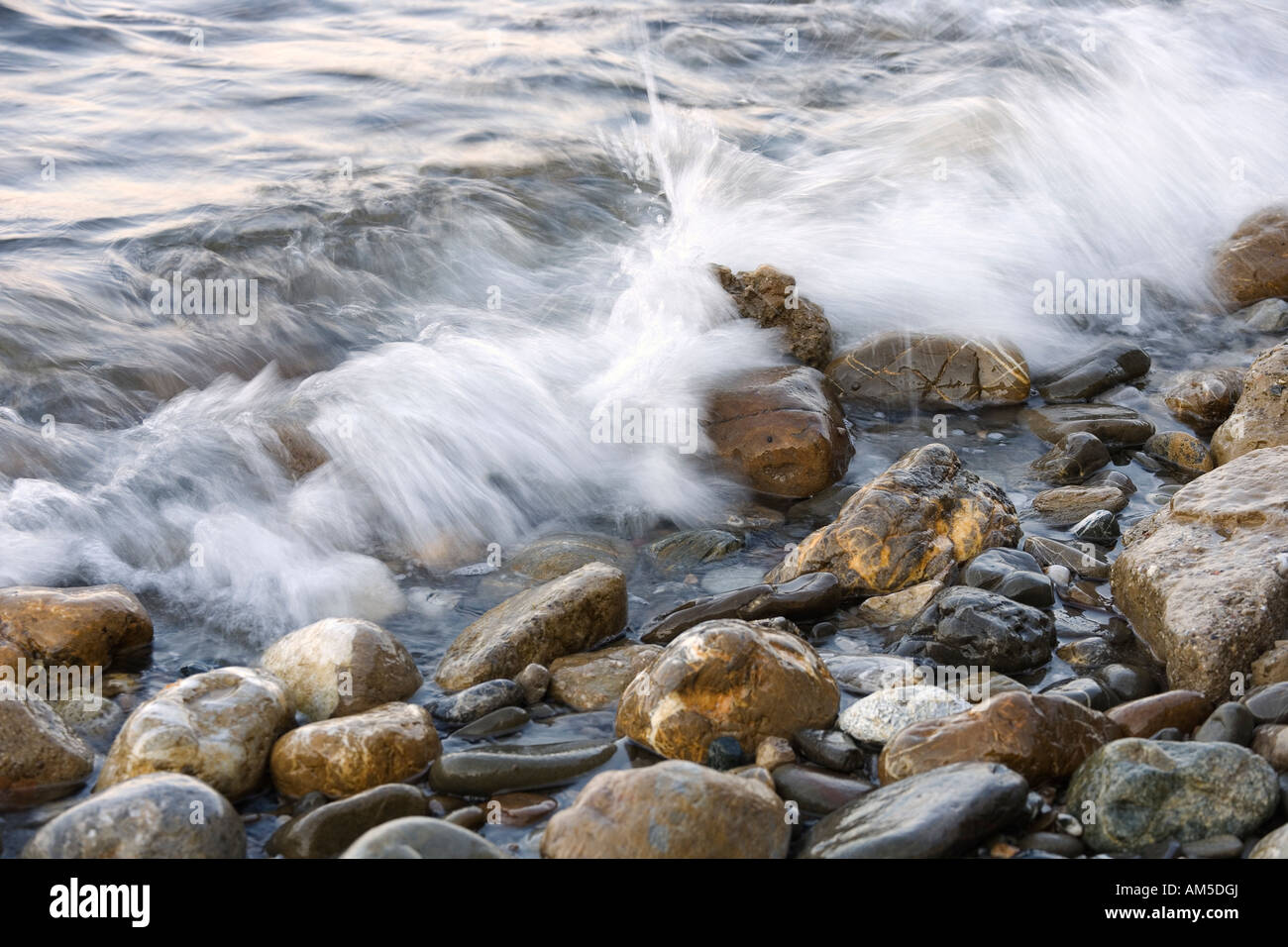 Rocks and waves Stock Photo - Alamy