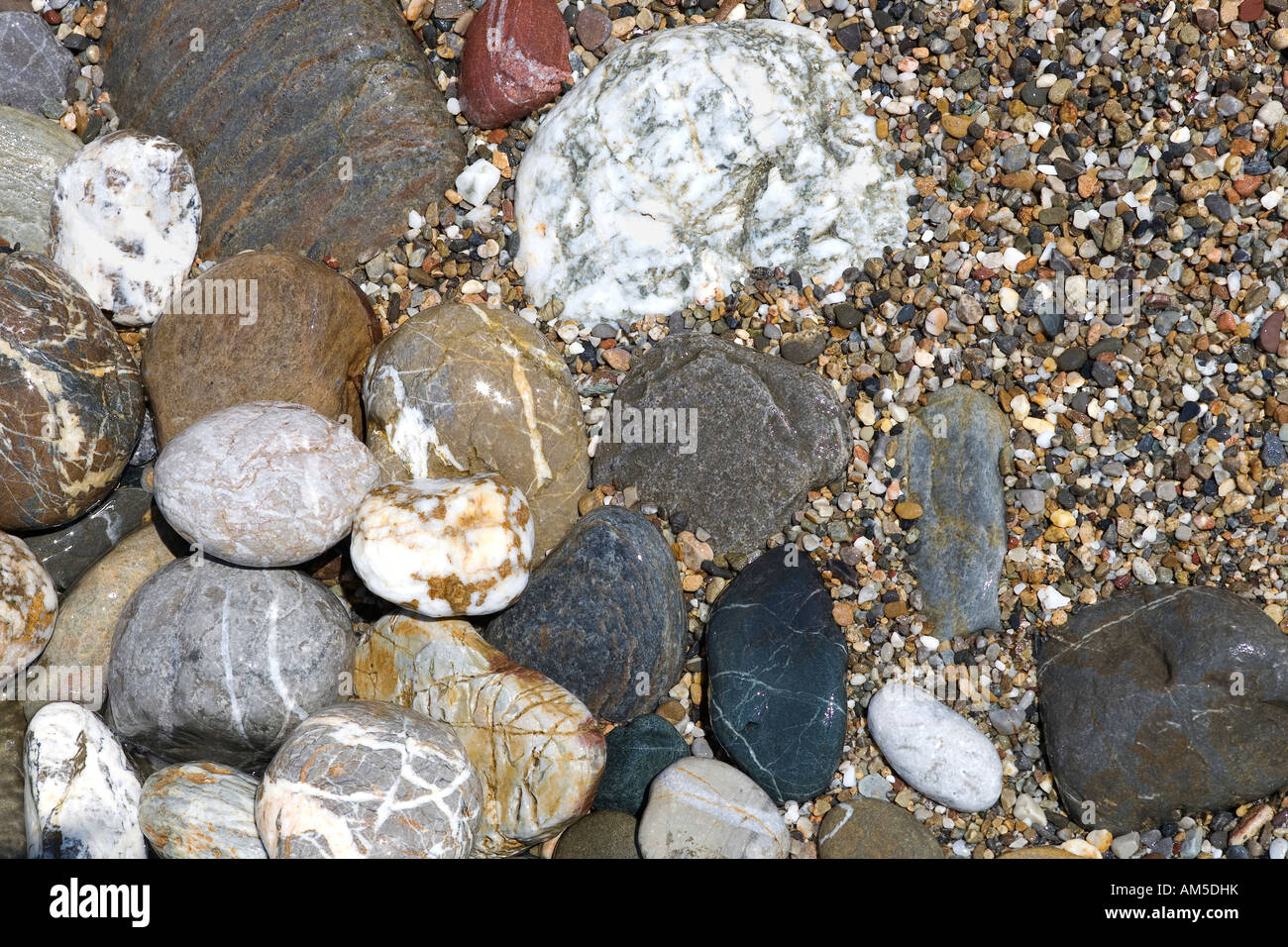 Wet pebble stones Stock Photo - Alamy
