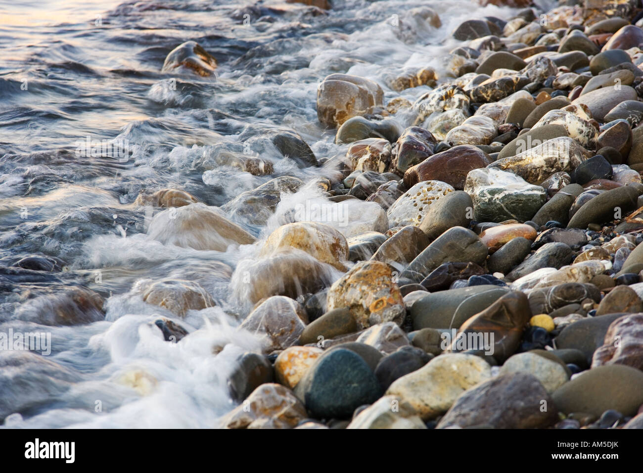 Rocks and waves Stock Photo - Alamy