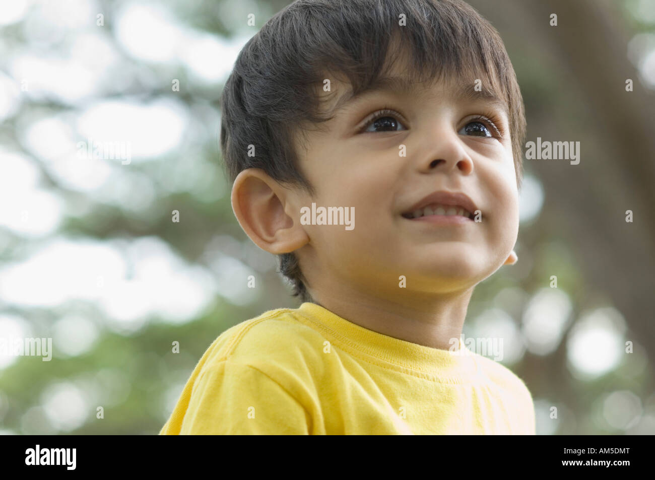 Close-up of a boy smiling Stock Photo - Alamy