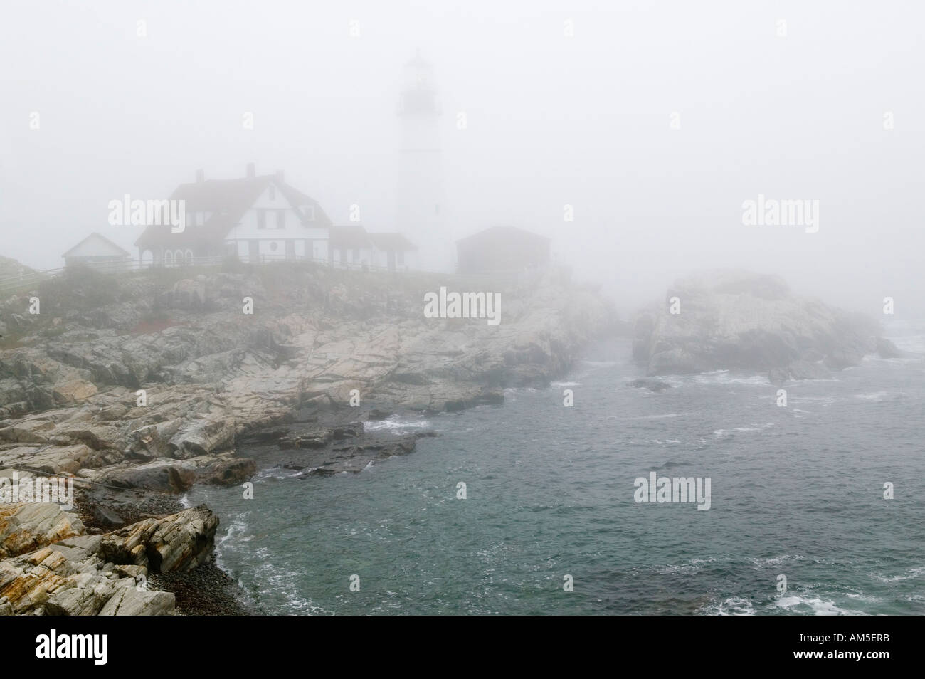 Fog shrouds portland head lighthouse hi-res stock photography and ...