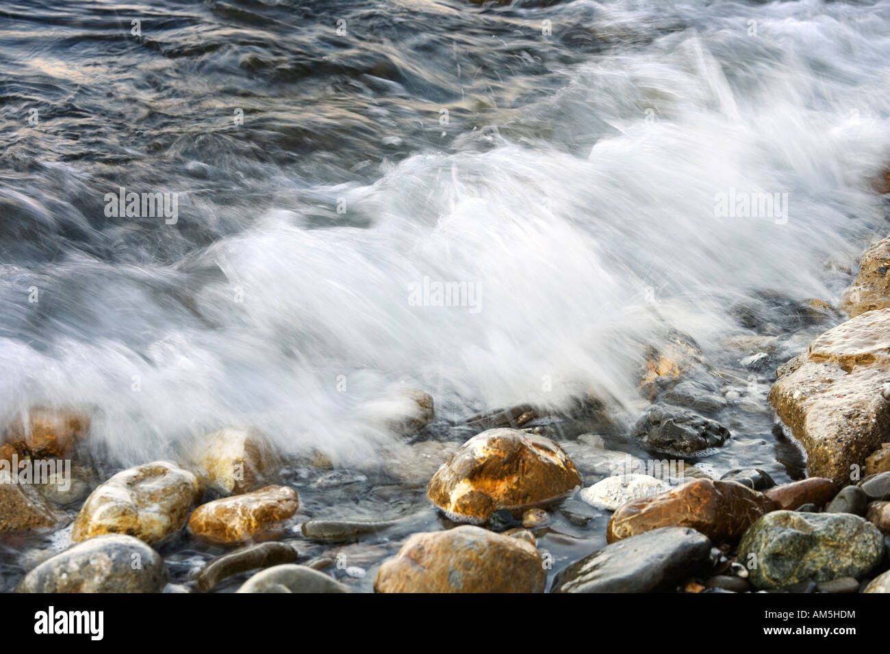 Rocks and waves Stock Photo - Alamy