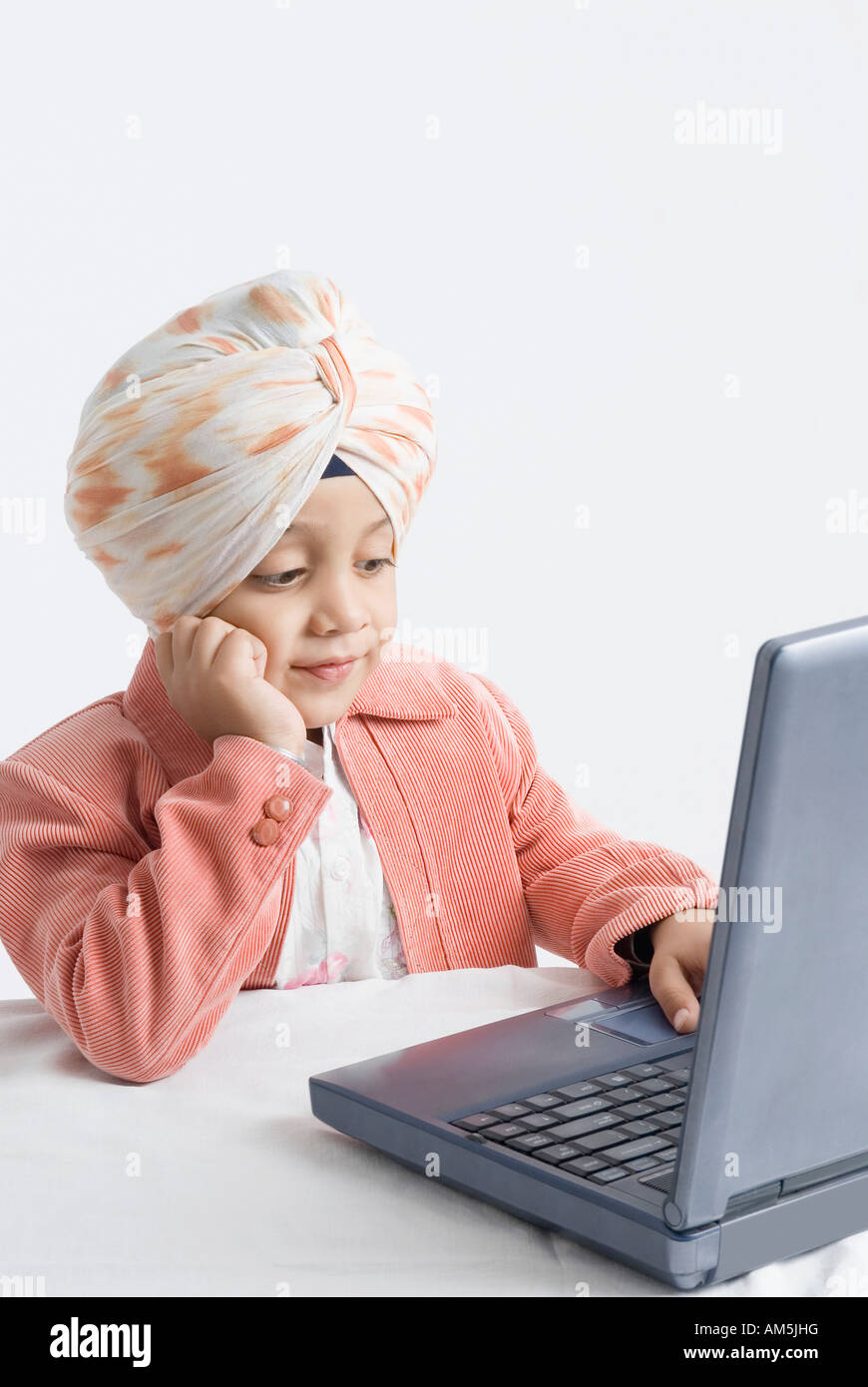 Boy working on a laptop Stock Photo - Alamy