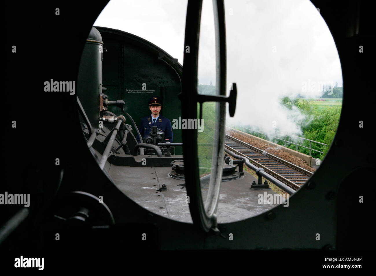 Historical steam train, view of the carriage with conductor Stock Photo ...
