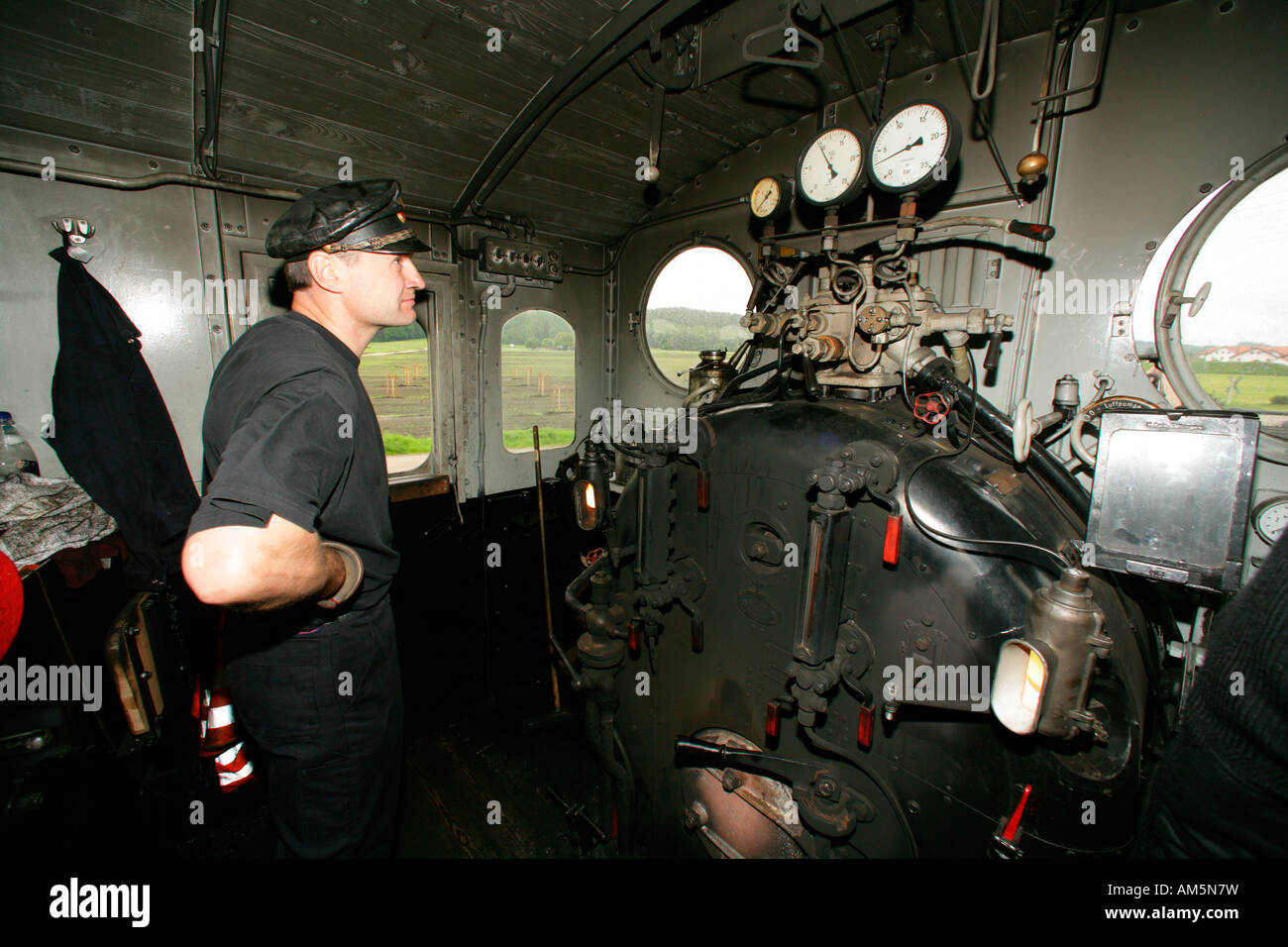 Man inspecting steam engine hi-res stock photography and images - Alamy