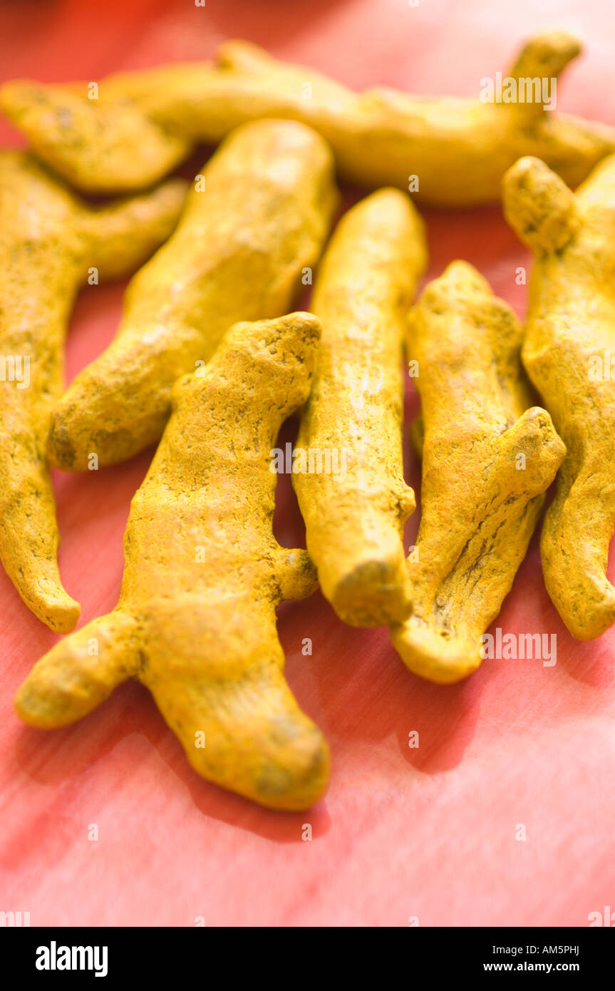 Close-up of dry turmeric in a tray Stock Photo - Alamy