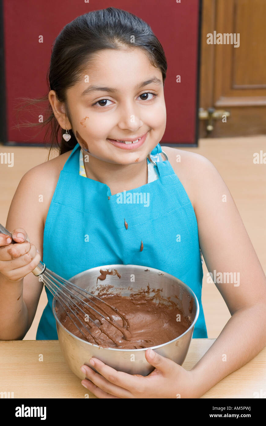 Child stirring sauce hi-res stock photography and images - Alamy