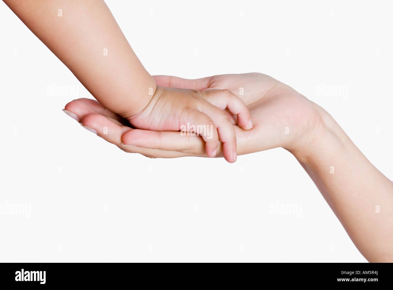 Close-up of a child hand touching her mother's hand Stock Photo - Alamy