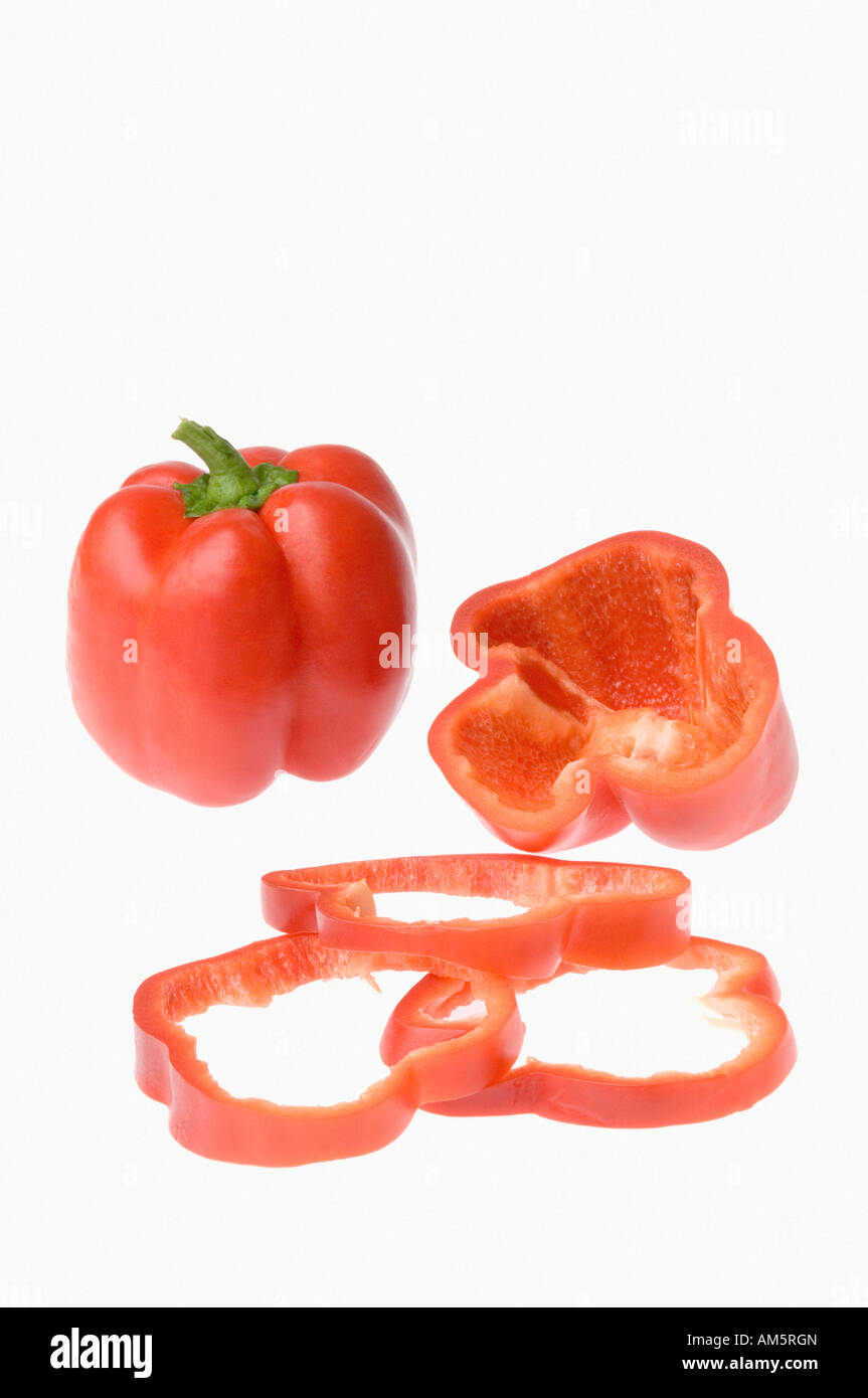 Close-up of a red bell pepper with slices Stock Photo - Alamy