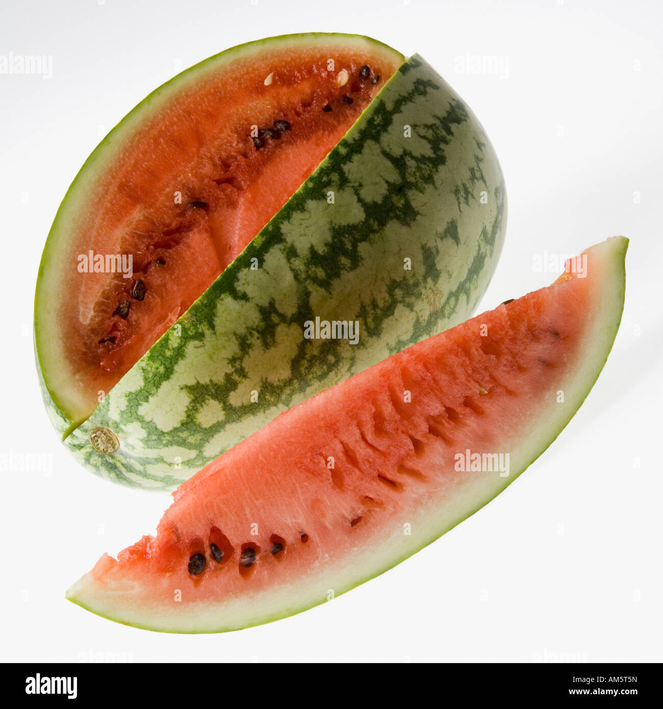 Close-up of a watermelon with its slice Stock Photo - Alamy
