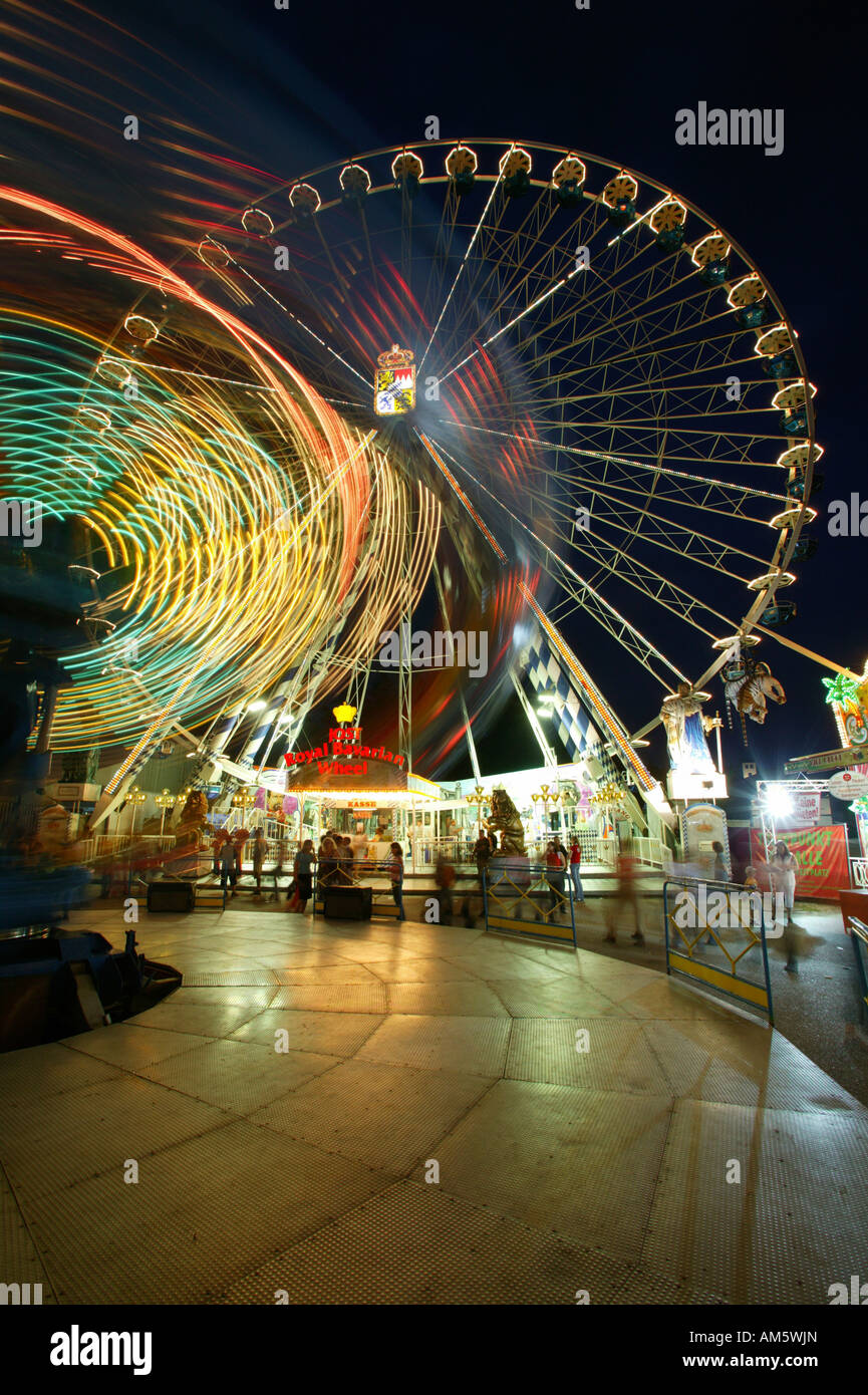 Giant wheel and carousel by night, funfair, Waldkraiburger Dult ...