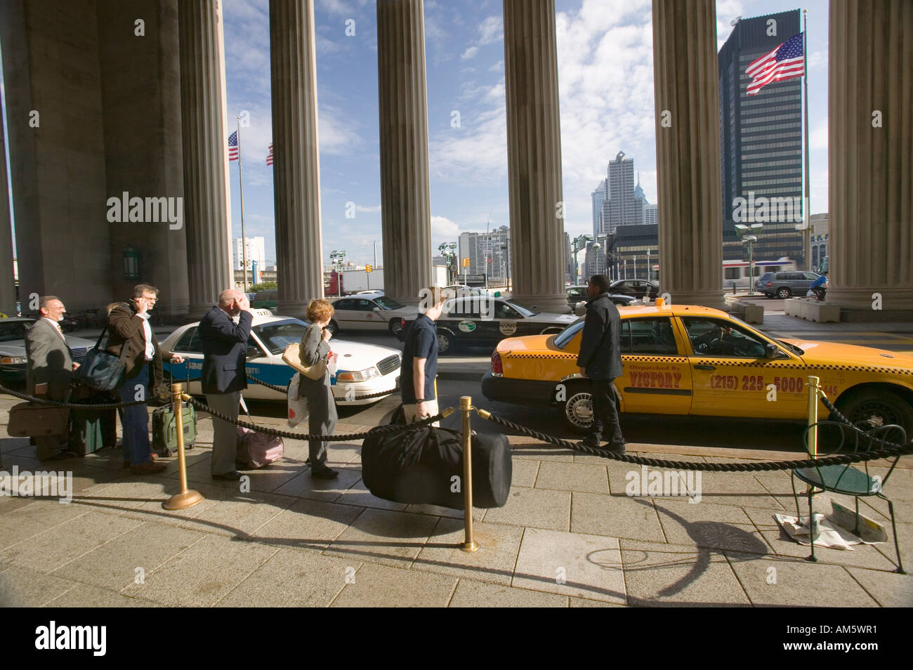 Exterior view of yellow taxi cab in front of the 30th Street Station a ...