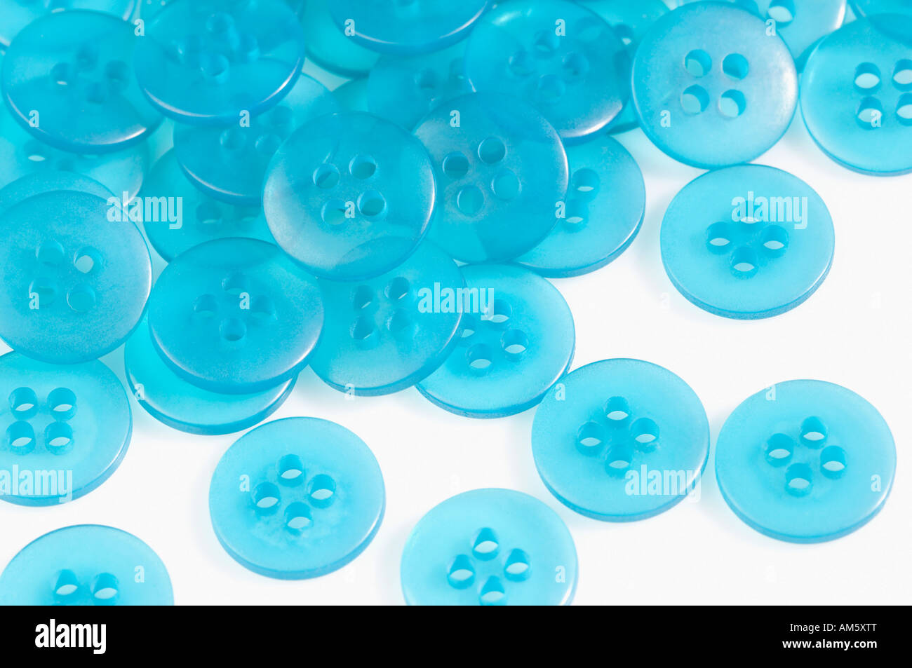 Close-up of sky blue buttons Stock Photo - Alamy
