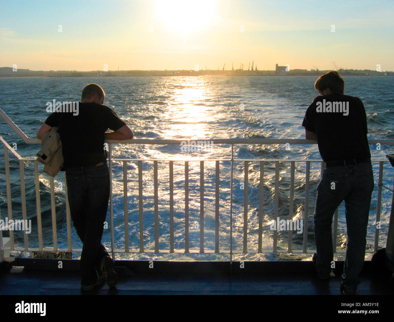 Sunset over Kattegat strait and Fredrikshavn town on Jutland peninsula ...