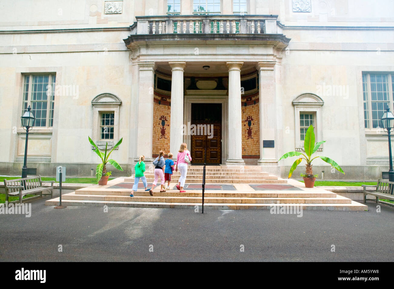 Mother and kids walk into Barnes Museum Philadelphia Pennsylvania Stock ...