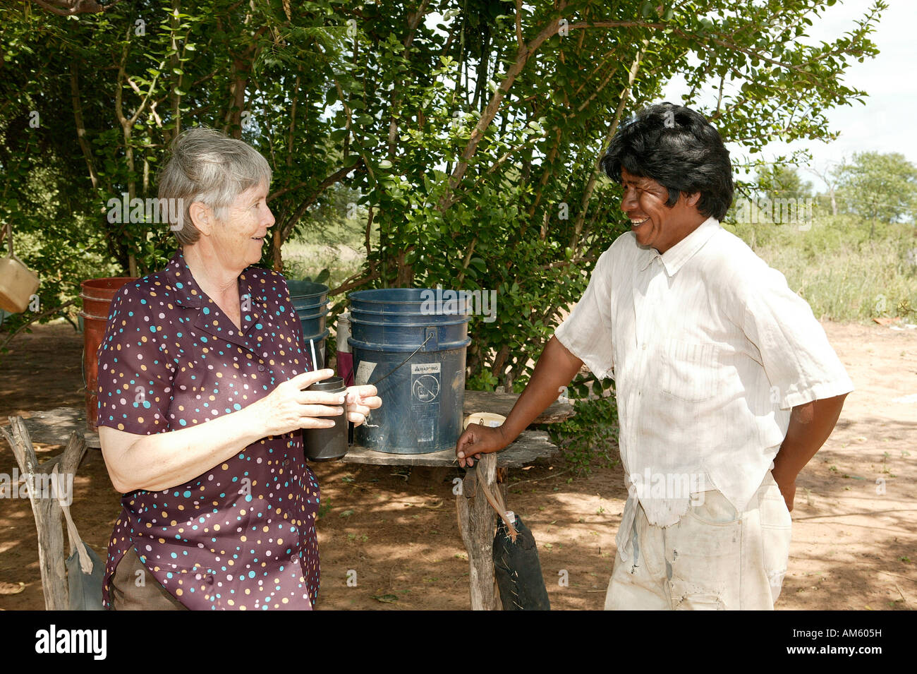 Female doctor with Nivaclé native American, Jothoisha, Chaco, Paraguay ...