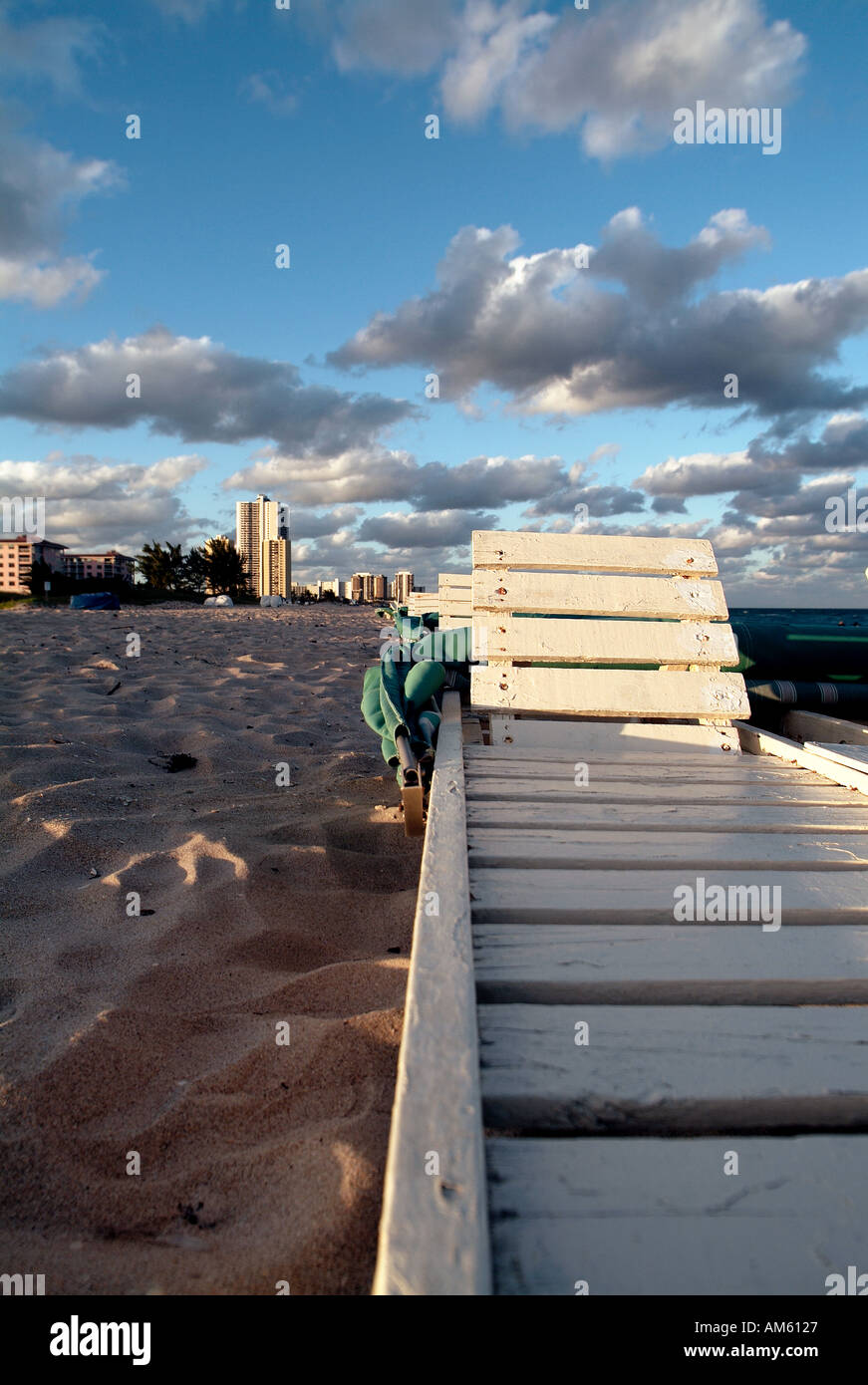 Row of white benches on a beach in West Palm Beach in Florida Stock ...