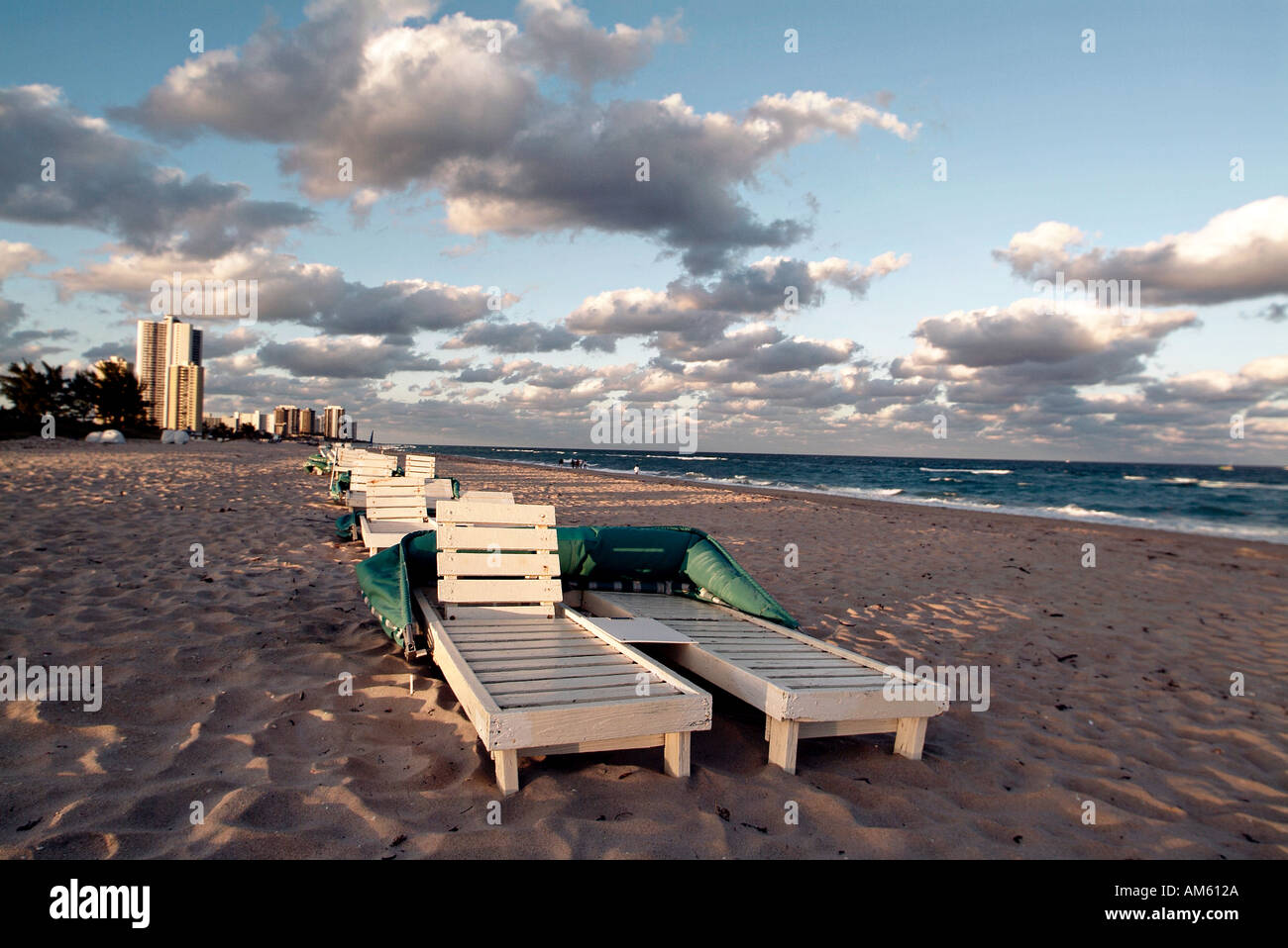 Row of white benches on a beach in West Palm Beach in Florida Stock ...