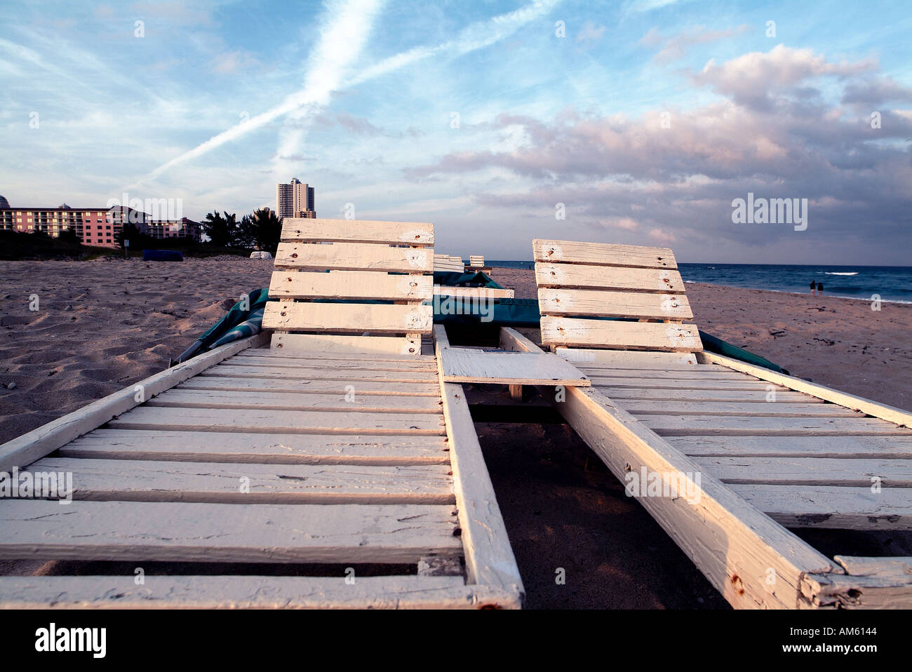 Row of white benches on a beach in West Palm Beach in Florida Stock ...