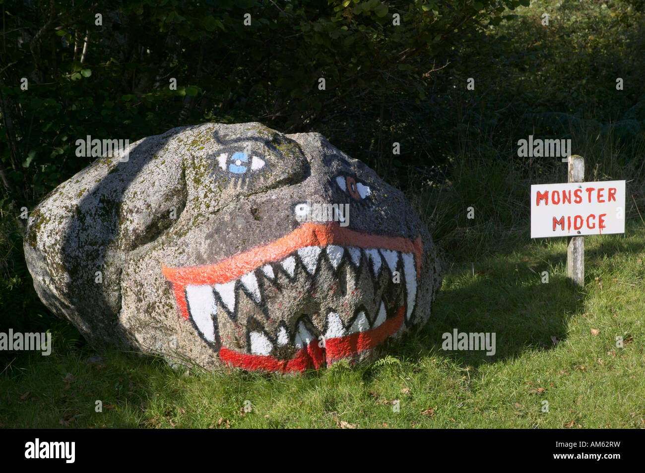 Large boulder painted as a Monster Midge near Kentra, Moidart, Highland ...