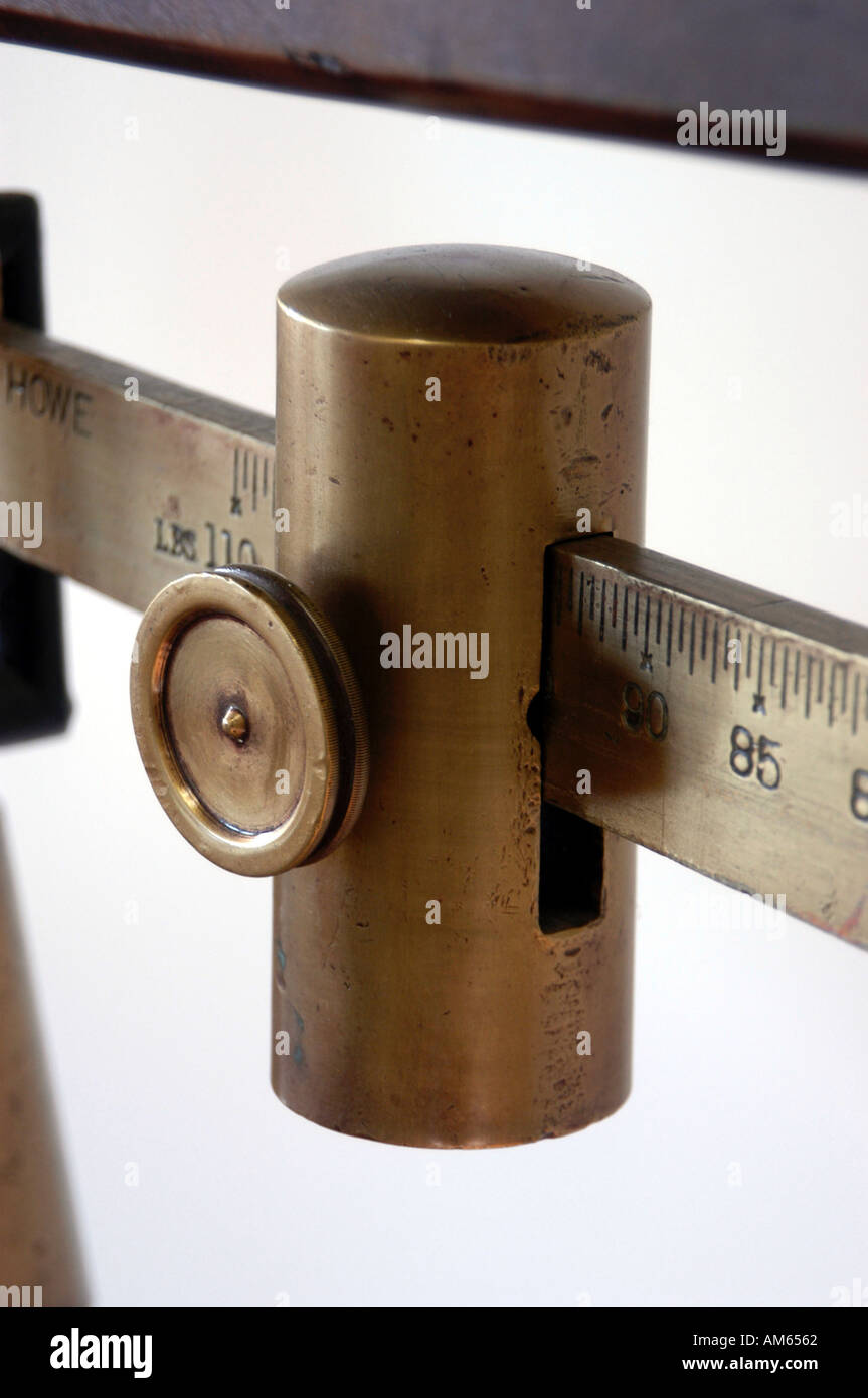 Brass counterweight on antique scale for weighing whiskey barrels Stock ...