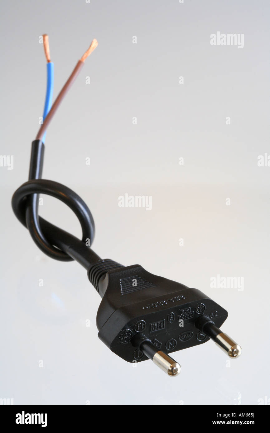 Pinched off power plug with bare cable end and knot in the cable Stock ...