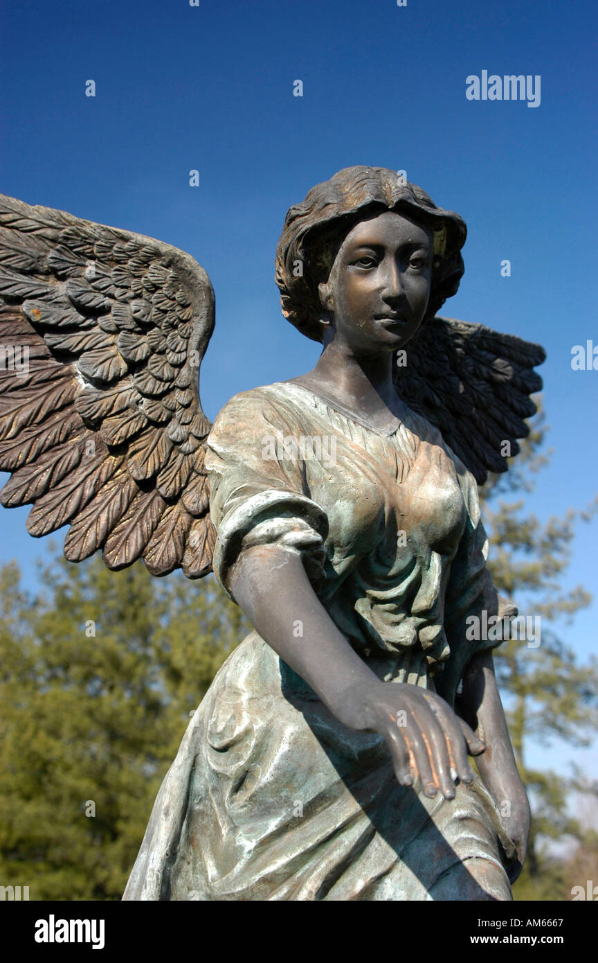 Bronze angel cemetery marker Stock Photo - Alamy