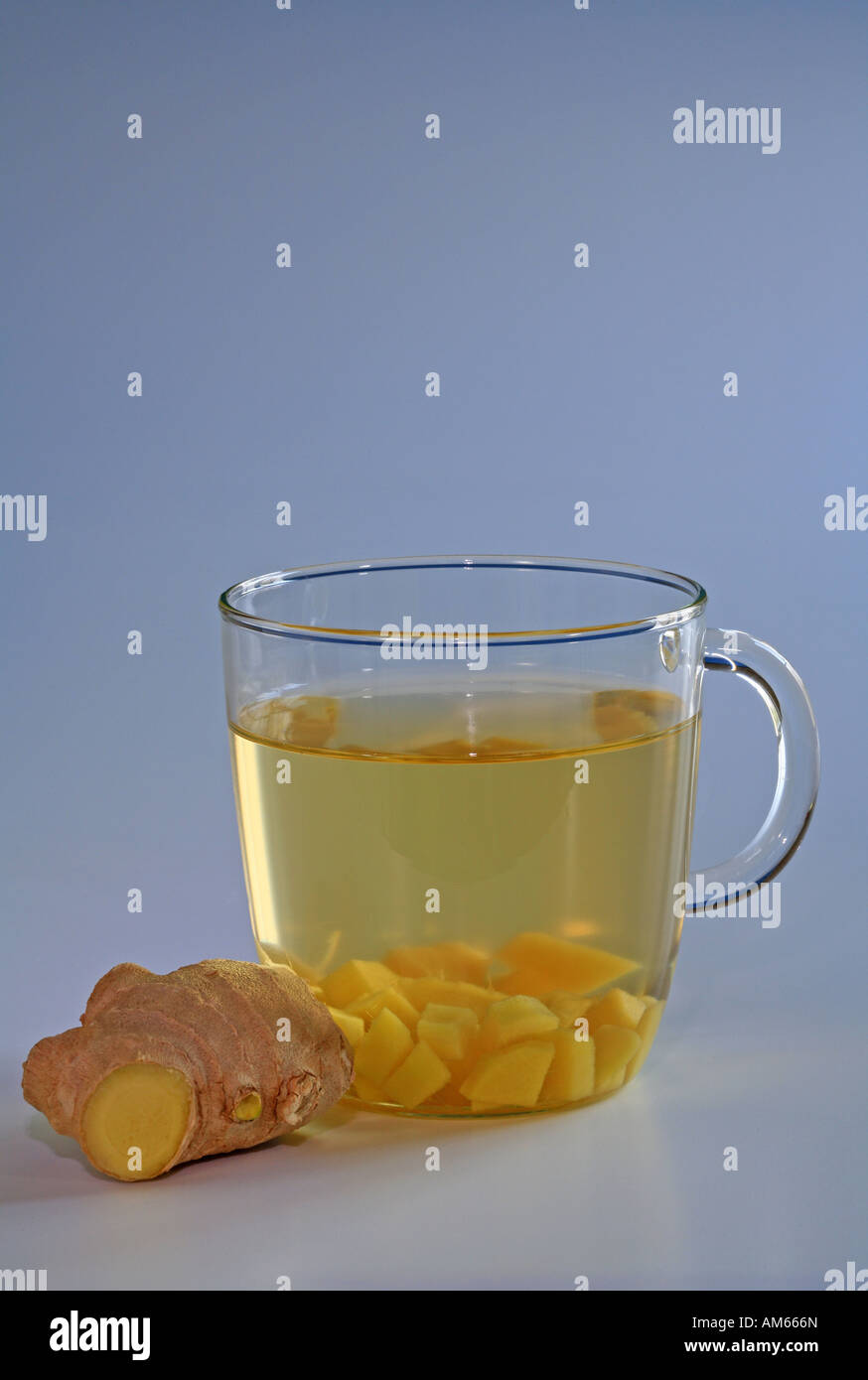 Infusion of fresh ginger in a glas Stock Photo - Alamy