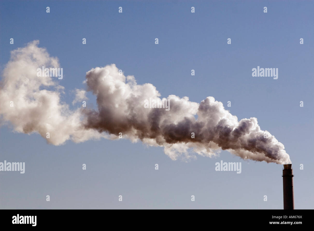 Factory Chimney Pumping Pollution Into the Atmosphere Stock Photo - Alamy