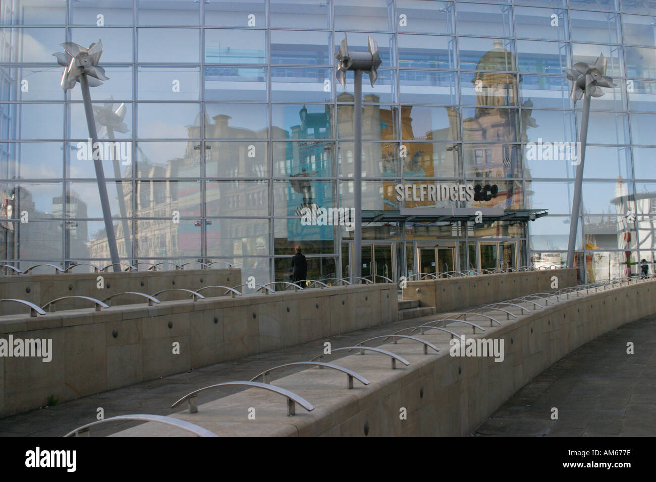 The Triangle reflected in the windows of Selfridges in Exchange Square ...