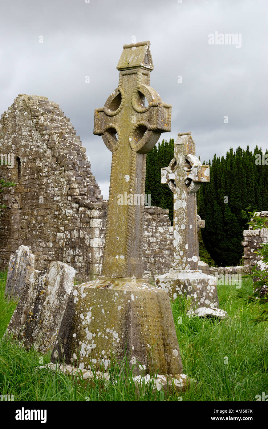 Inclined celtic style highcrosses mounted on remains of old monastary ...