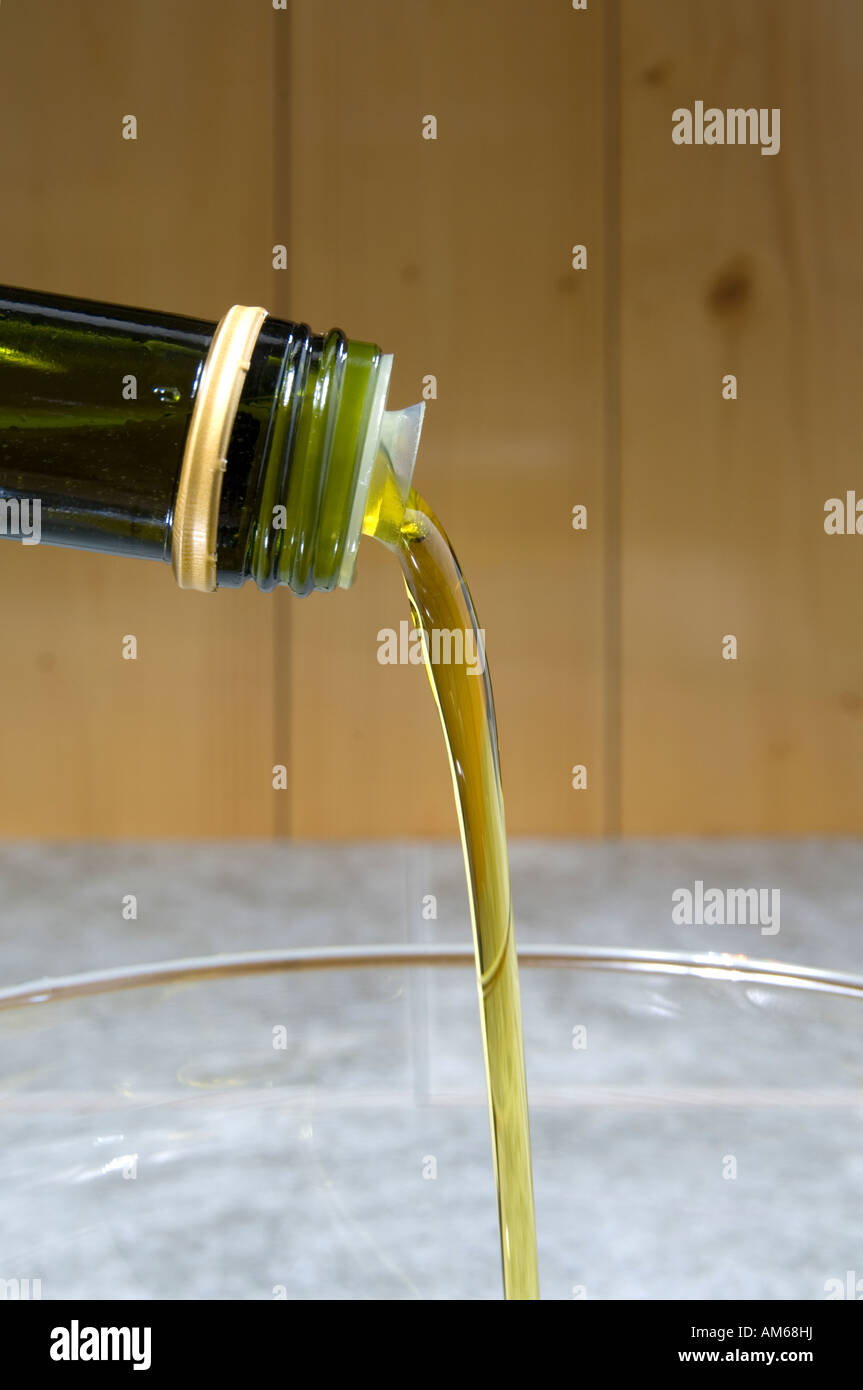 Olive oil dressing pour golden hi-res stock photography and images - Alamy
