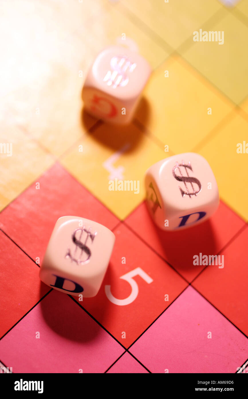 Dollar Sign Dice on Game Board Stock Photo - Alamy